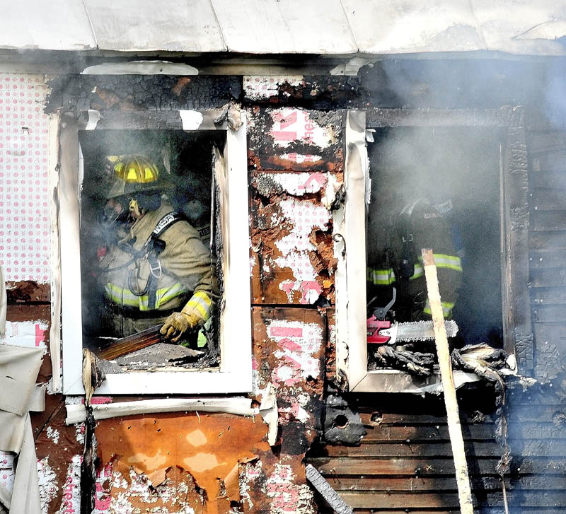 Baby-sitter saves the day in Belgrade fire; home destroyed