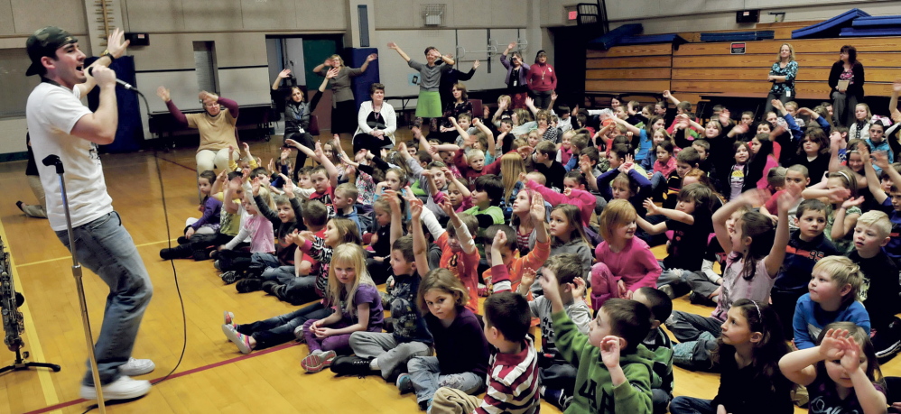 Hip-hop artist tells New Sharon kids to pursue their dreams