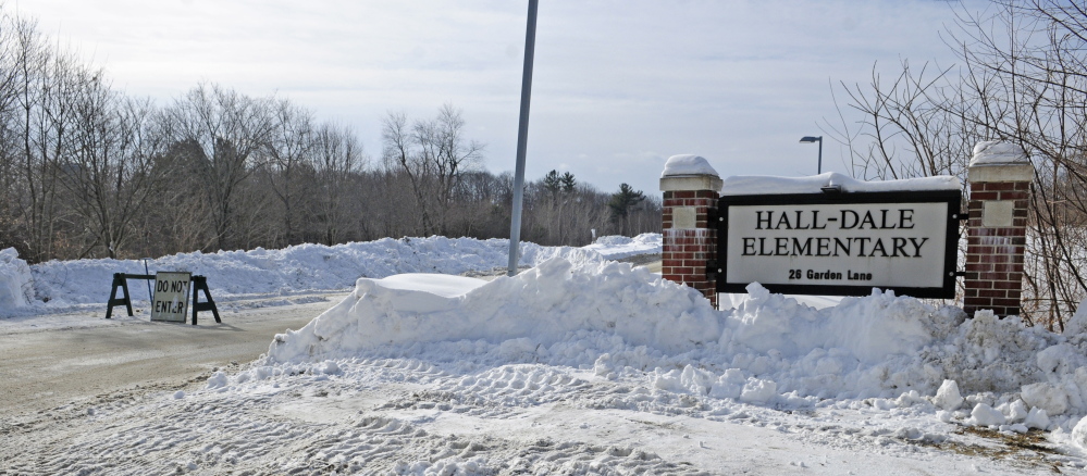 Excavator removing snow breaks gas pipe to Hall-Dale Elementary