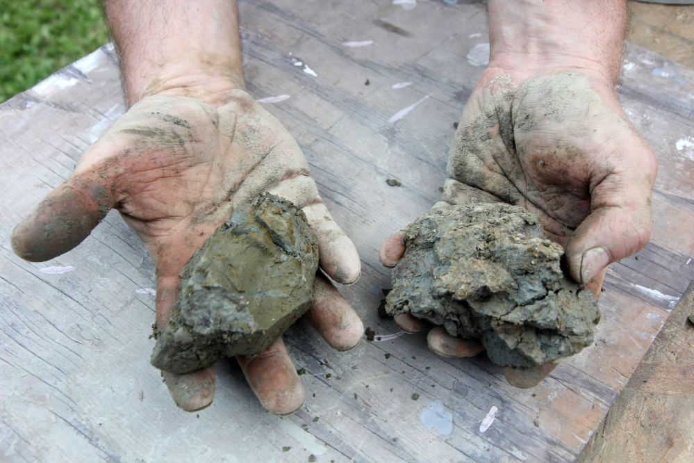 Digging up pottery clay by the ton in Wayne backyard