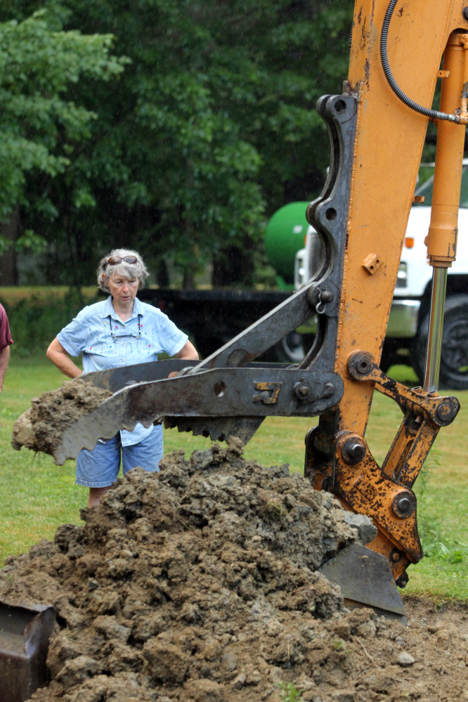 Digging up pottery clay by the ton in Wayne backyard