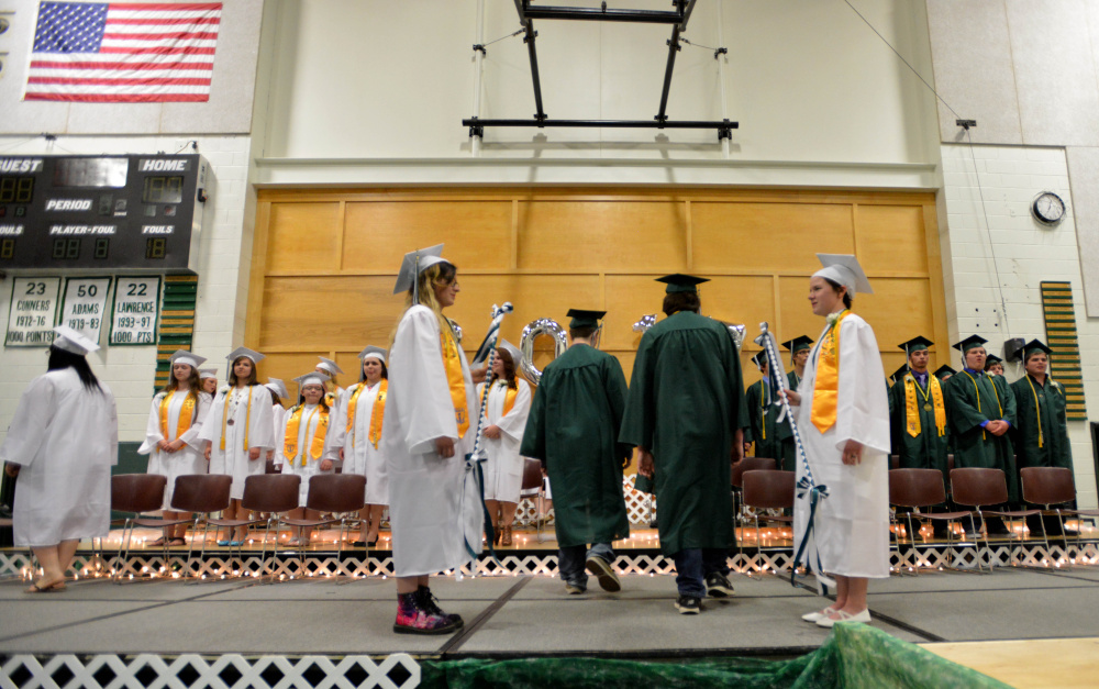 Twin sisters graduate top of their class at Carrabec High School