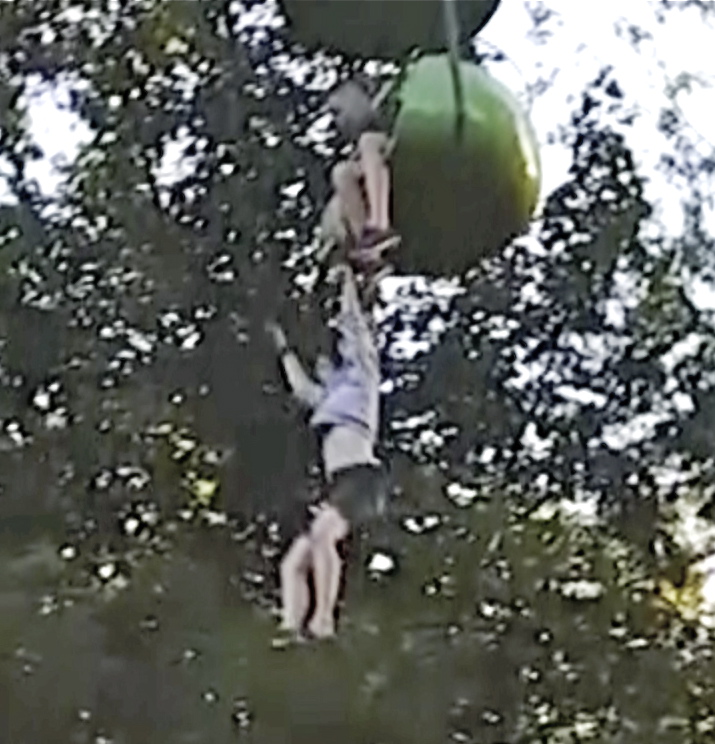 Onlookers catch teen falling from amusement park ride