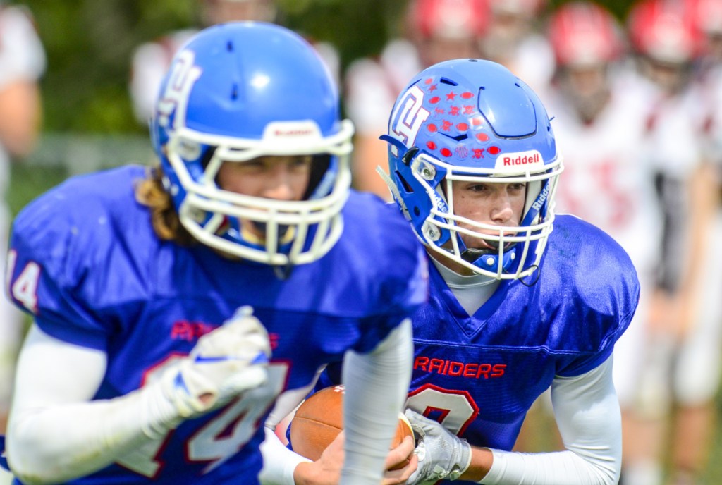 Wells football breaks open tight contest to throttle Oak Hill