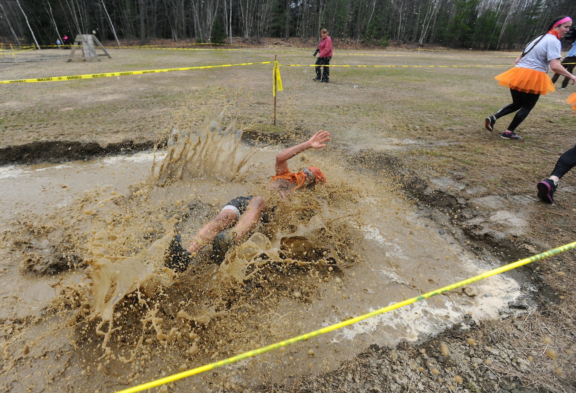 Hundreds run, climb, crawl through mud at Thomas College