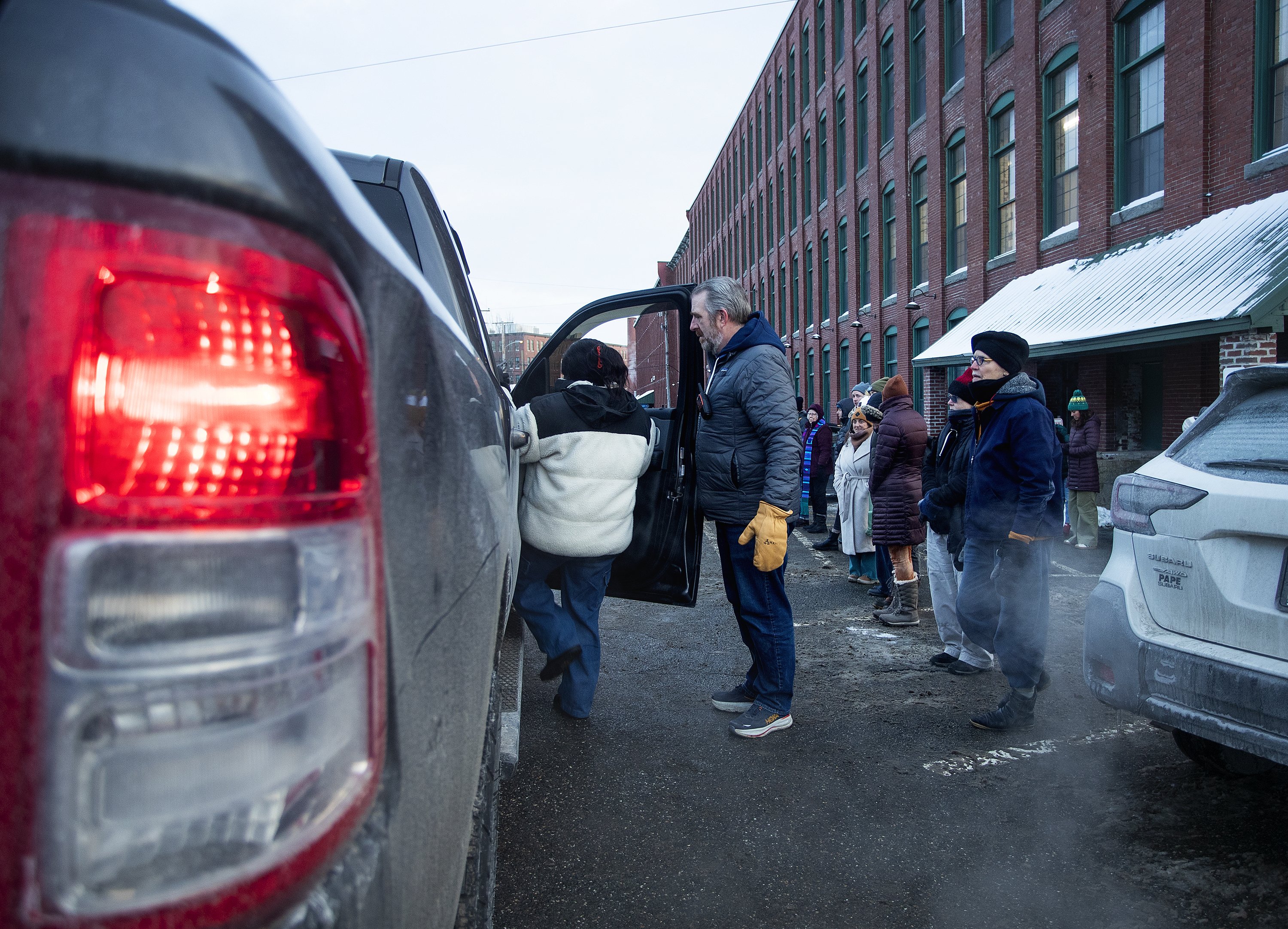 Maine volunteers form human wall to protect immigrant workers